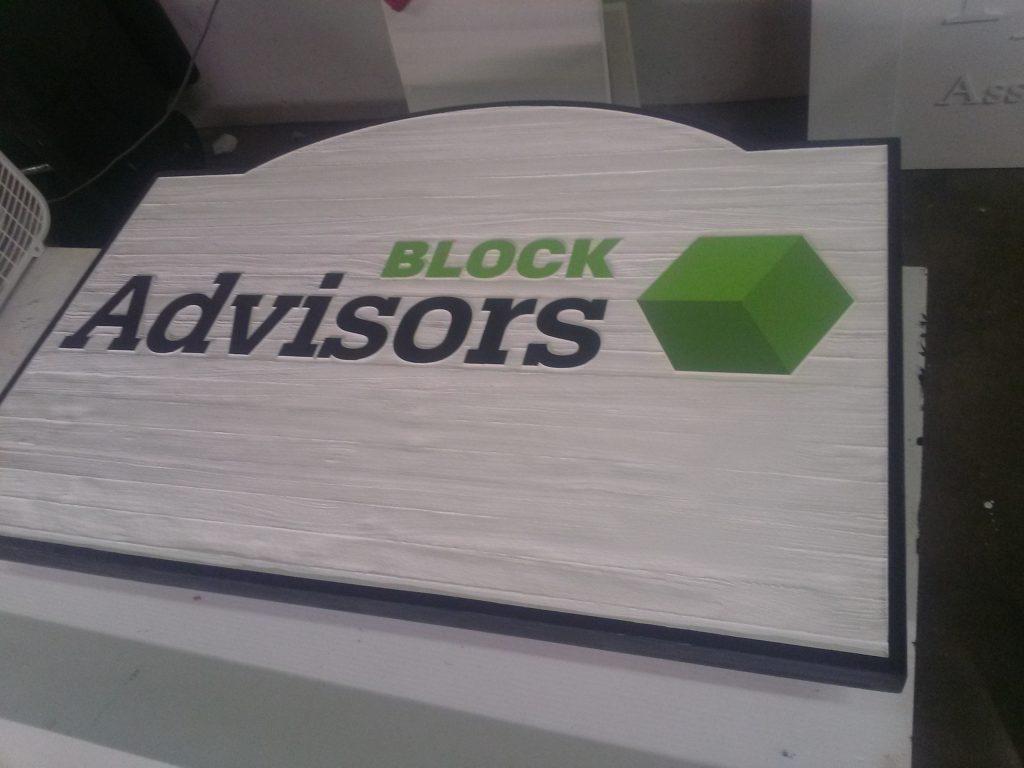 Block advisors sandblasted wood sign | Baker Sign Group